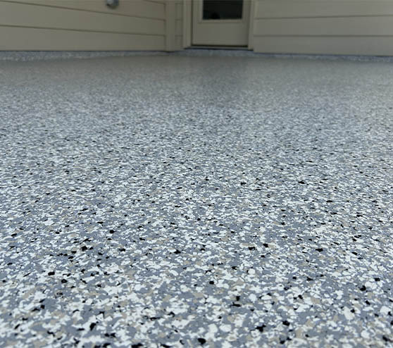 Epoxy Flake Flooring for Homeowner Garage and Patio in Conroe | MACH ONE®